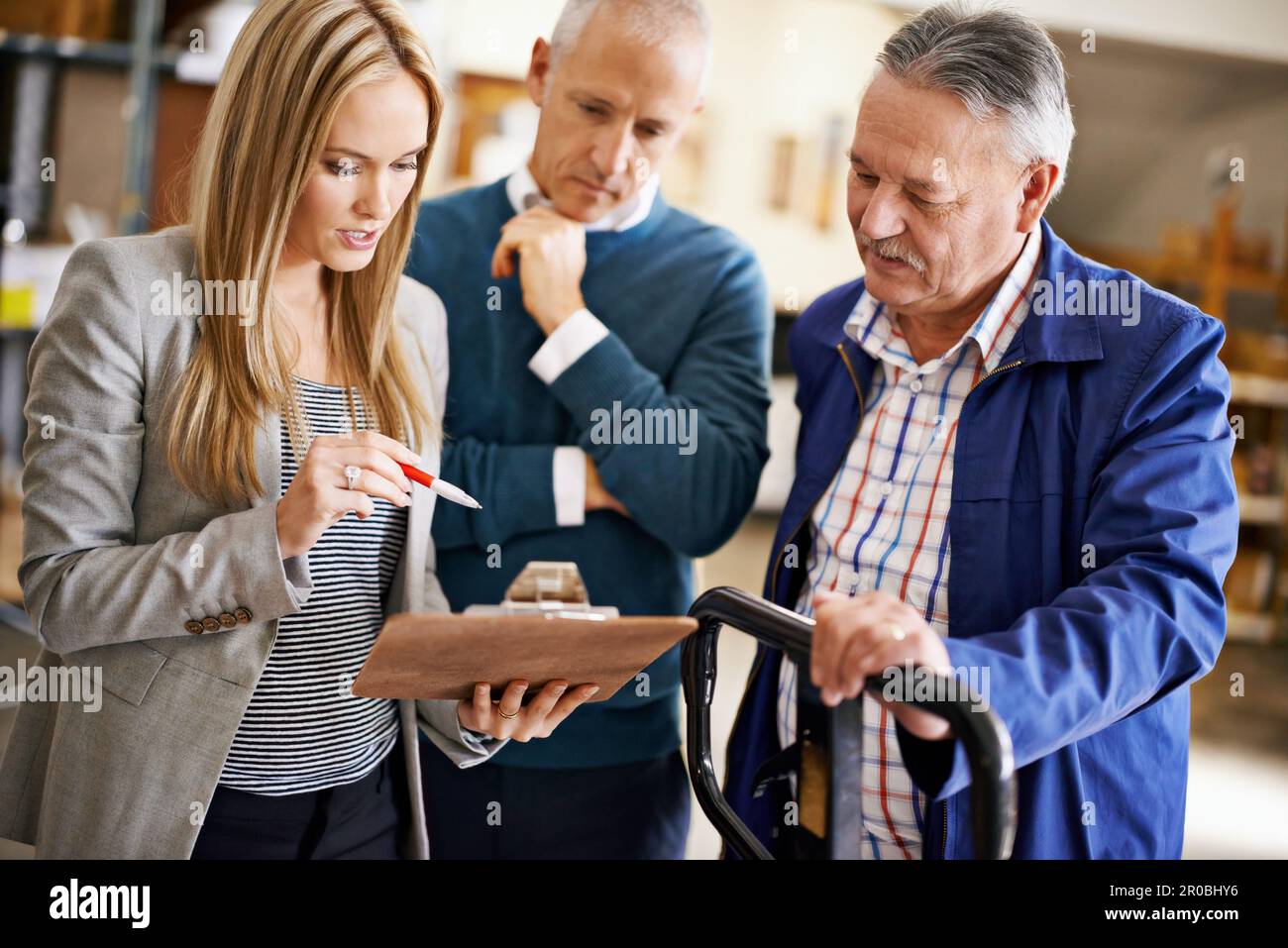 Let them take care of your shipping needs. people at work in a ...