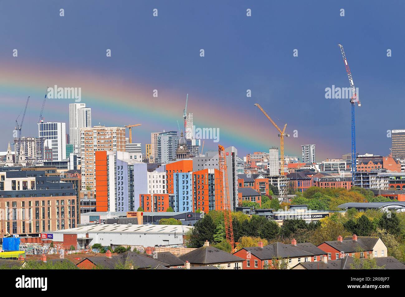 An amazing vibrant low rainbow appears briefly after heavy rain over ...
