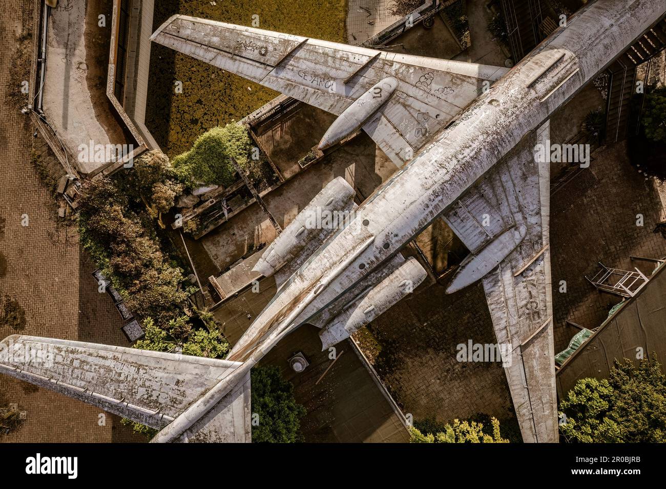 An impressive aerial shot of an abandoned airplane, left to rust and ...