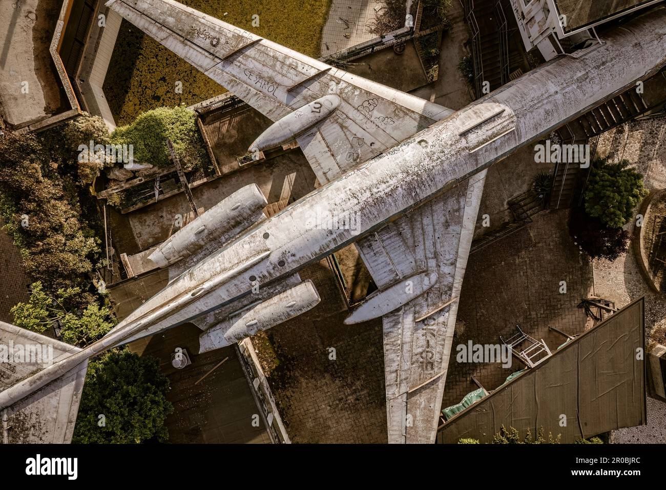 An impressive aerial shot of an abandoned airplane, left to rust and ...