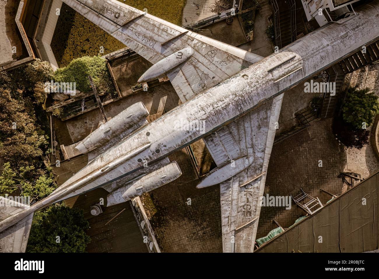 An impressive aerial shot of an abandoned airplane, left to rust and ...