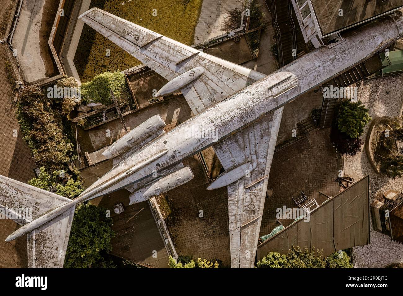 An impressive aerial shot of an abandoned airplane, left to rust and ...