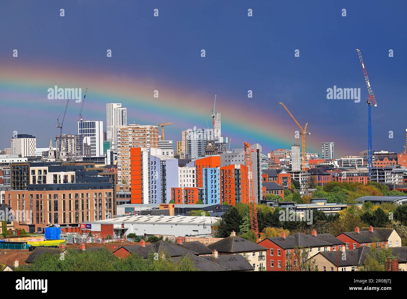An amazing vibrant low rainbow appears briefly after heavy rain over ...