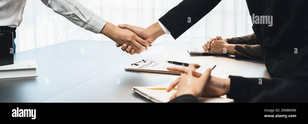 Interviewer handshaking the applicant hi-res stock photography and ...