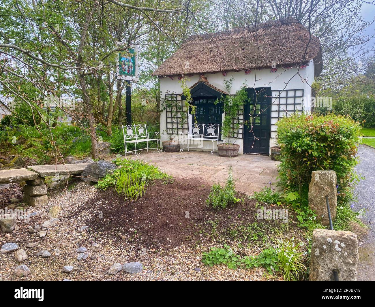 Small country pub in the woods Stock Photo - Alamy
