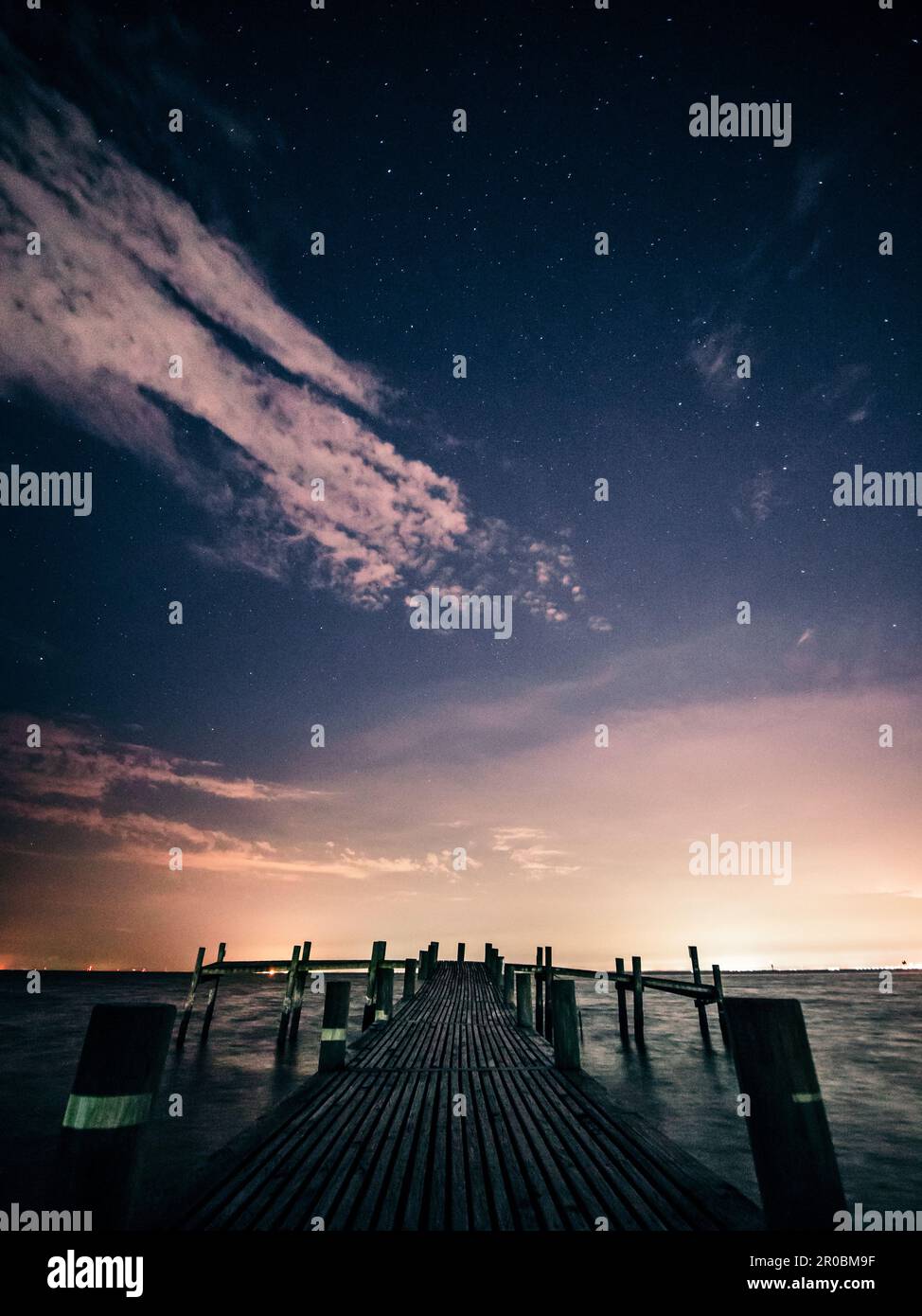 Pier at night Stock Photo - Alamy