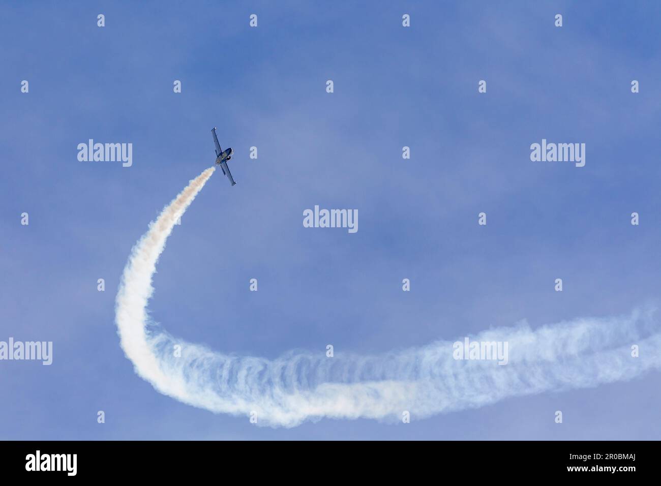 Breitling jet looping Aerolac with smoke trail Stock Photo - Alamy