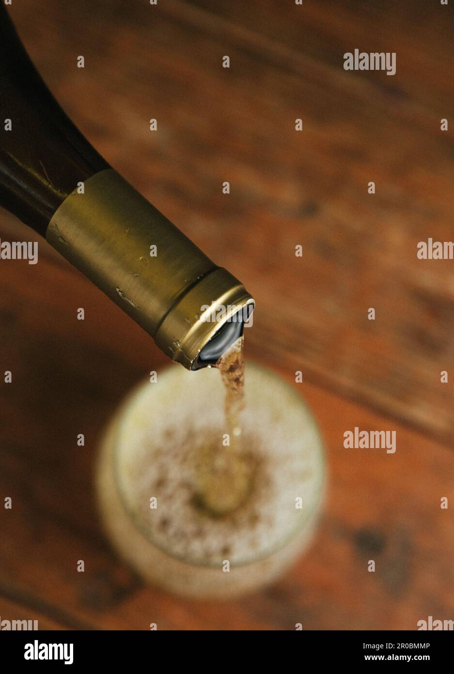Shallow Depth of Field Pouring Champagne into a Glass Stock Photo - Alamy