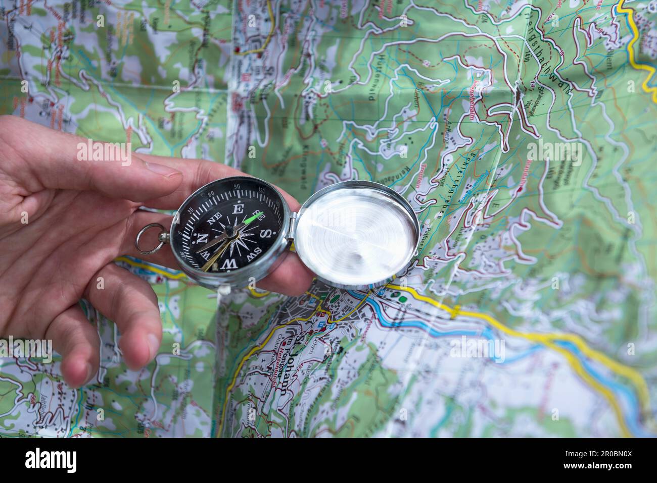 Hiker check route on map with Compass, Bavaria, Germany Stock Photo - Alamy