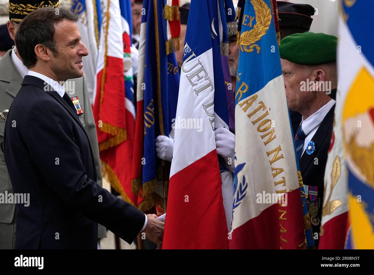 French President Emmanuel Macron meets war veterans during ceremonies ...