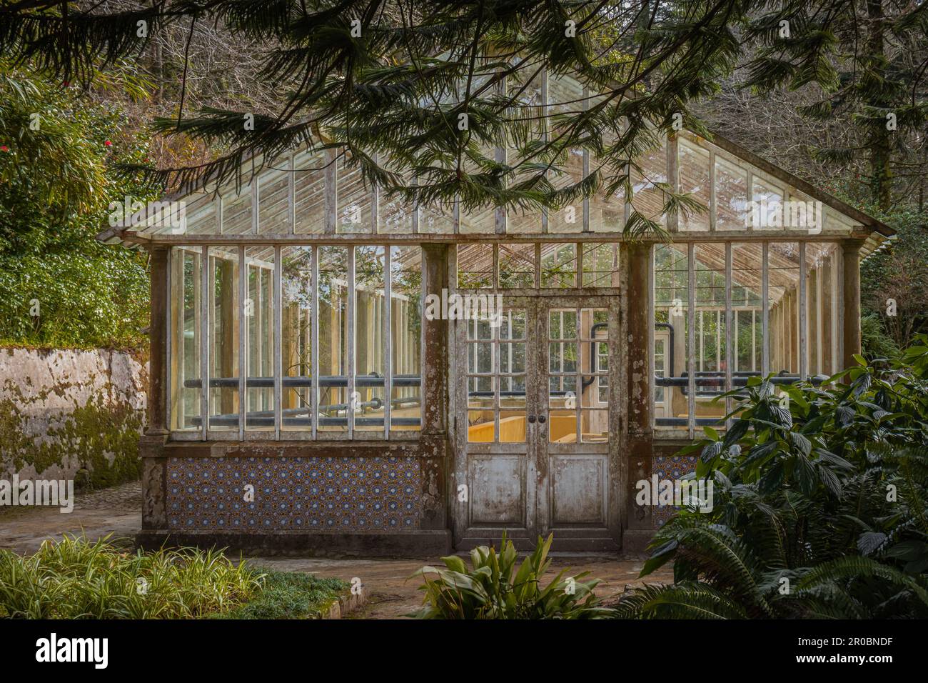 An old greenhouse, hot house, in the Pena natural park, Sintra, fairy ...