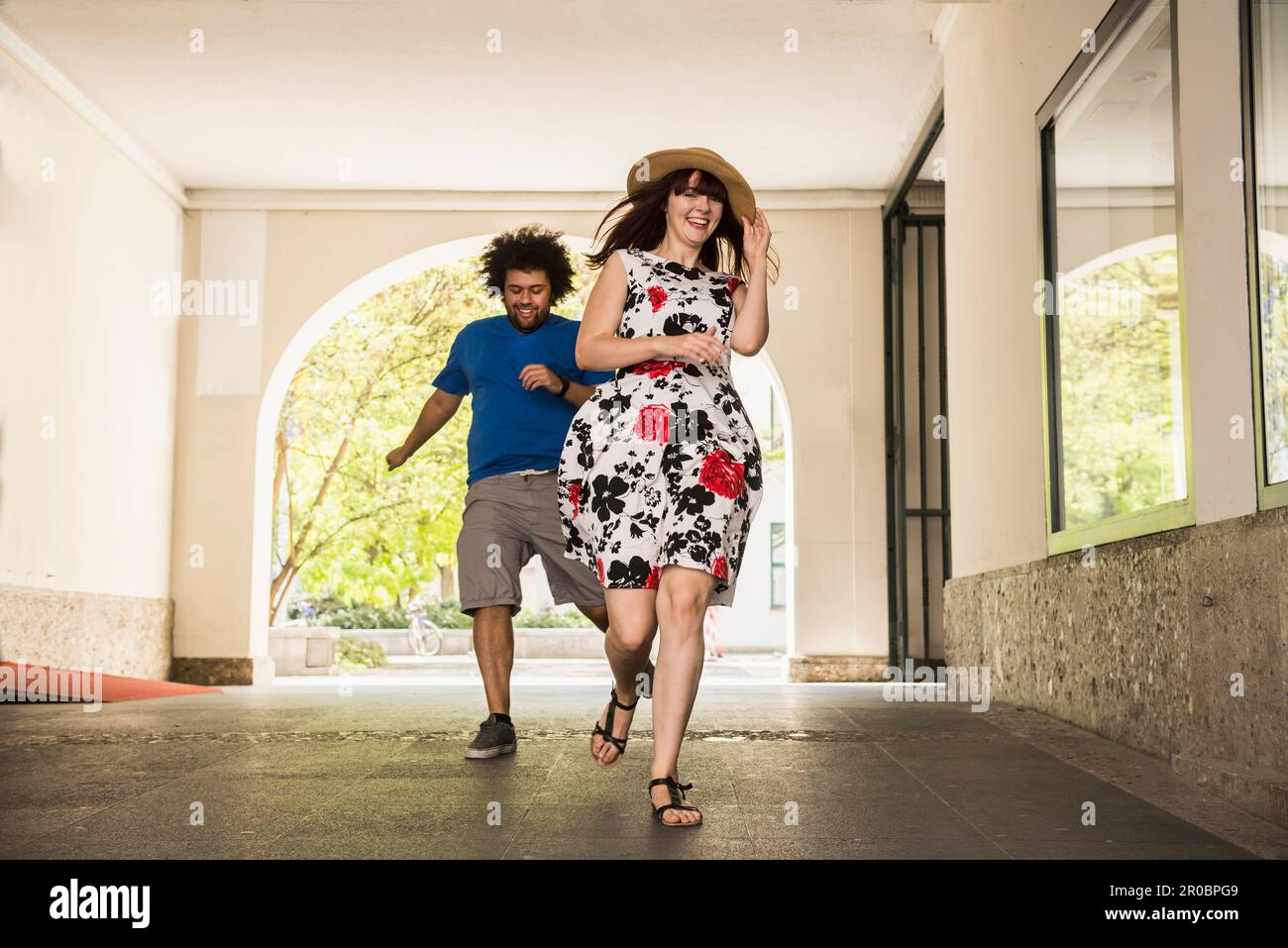 Adults running young hi-res stock photography and images - Alamy