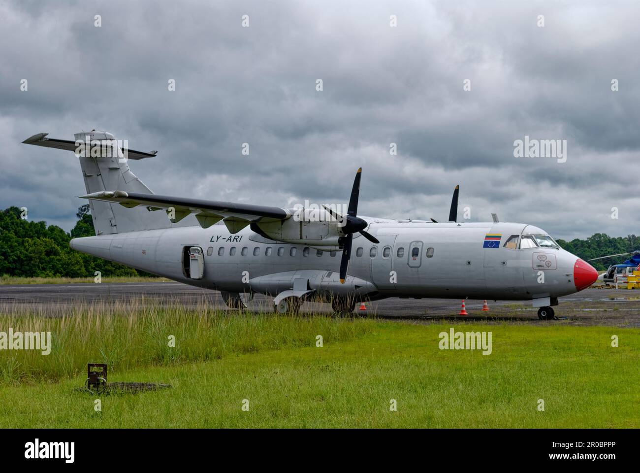 An ATR-42 Transport Aircraft parked on the Apron tarmac at Gamba ...
