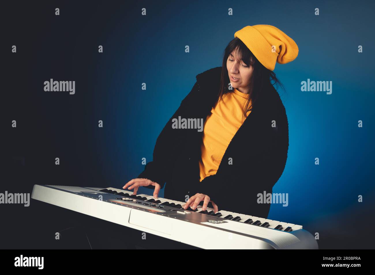 Female keyboard player performing hi-res stock photography and images ...
