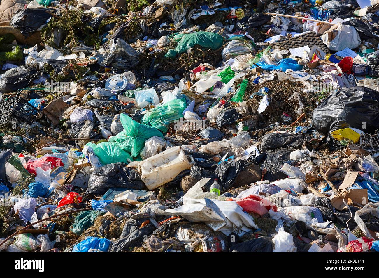 Open air garbage dump. Plastic pollution. Recycling junk. Consumerism ...