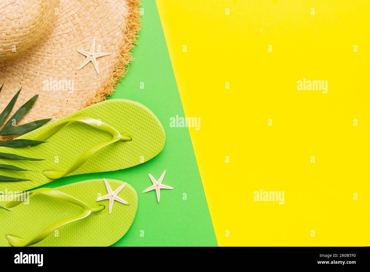 Summer vacation concept flat lay. straw hat beach accessories and flip ...