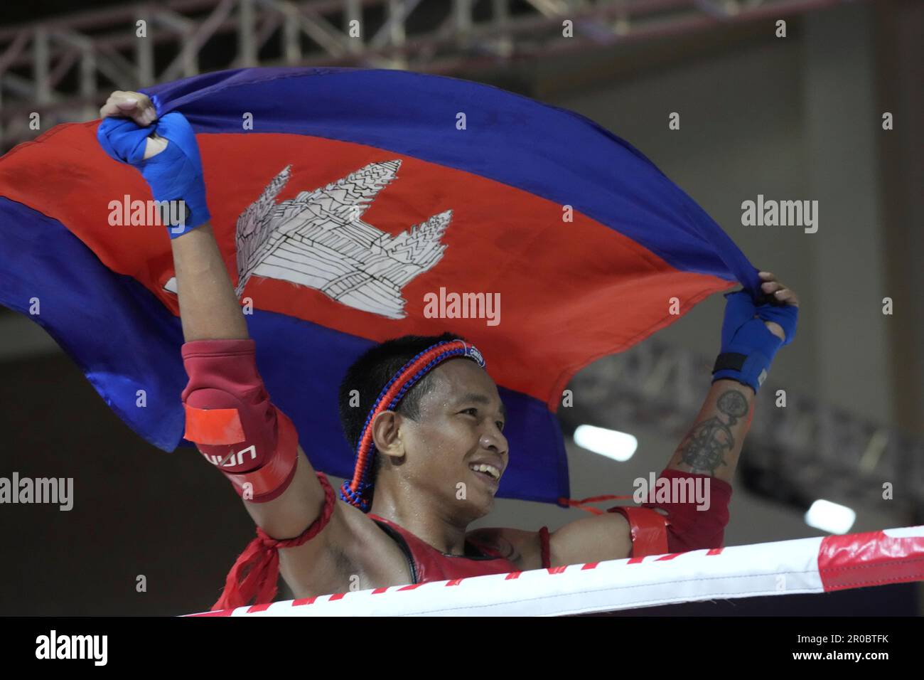 Koemrieng Him of Cambodia celebrates after beating Hein Thu Aung of ...