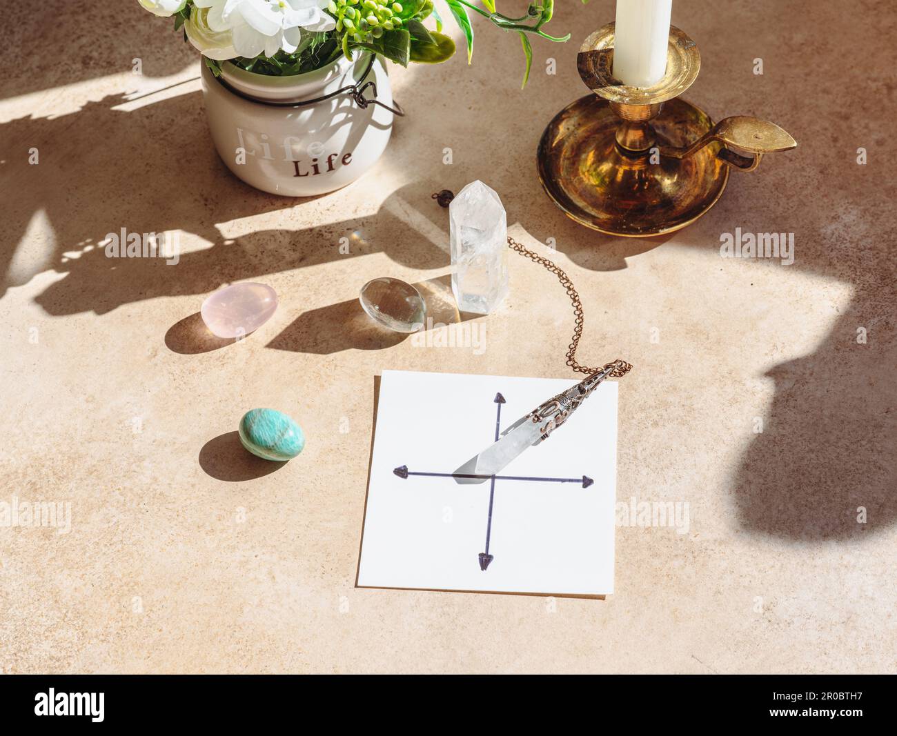 Crystal pendulum hi-res stock photography and images - Alamy