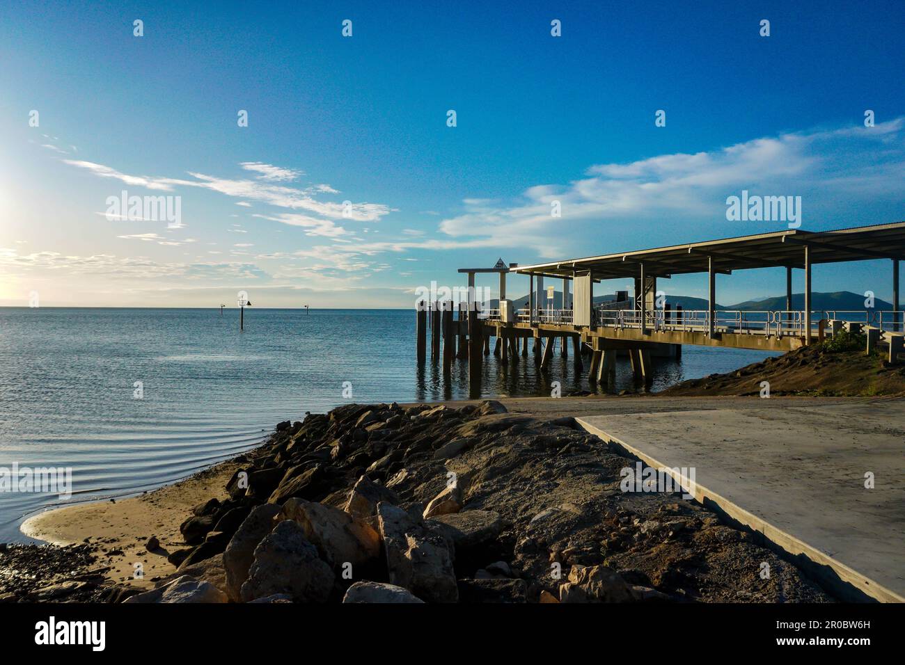A wooden pier extending into a large body of water, Jetty on Palm ...