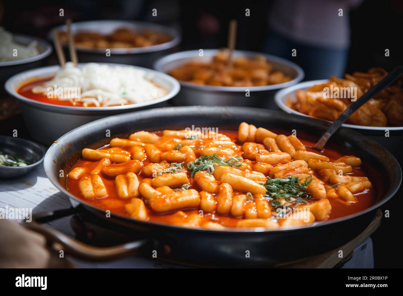 A plate of food with a pot of noodles Stock Photo - Alamy