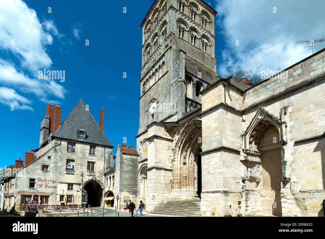 La Charité-sur-Loire. The Sainte-Croix tower-bell and the gothic gates ...