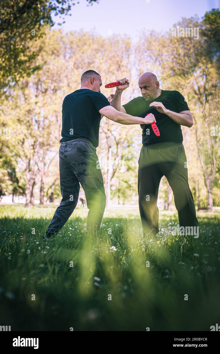 Knife vs knife fight combat training. Sumbrada training method. Plastic ...