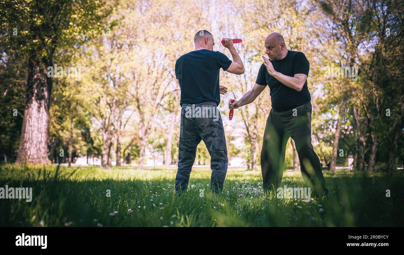 Knife vs knife fight combat training. Sumbrada training method. Plastic ...