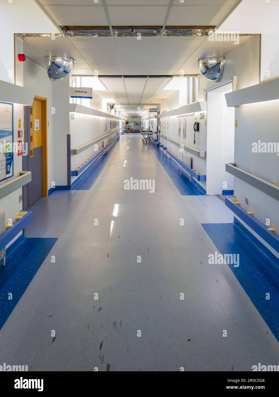 Long empty hospital walkway in england uk Stock Photo - Alamy