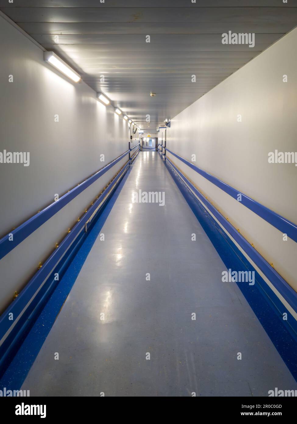 Long empty hospital walkway in england uk Stock Photo - Alamy