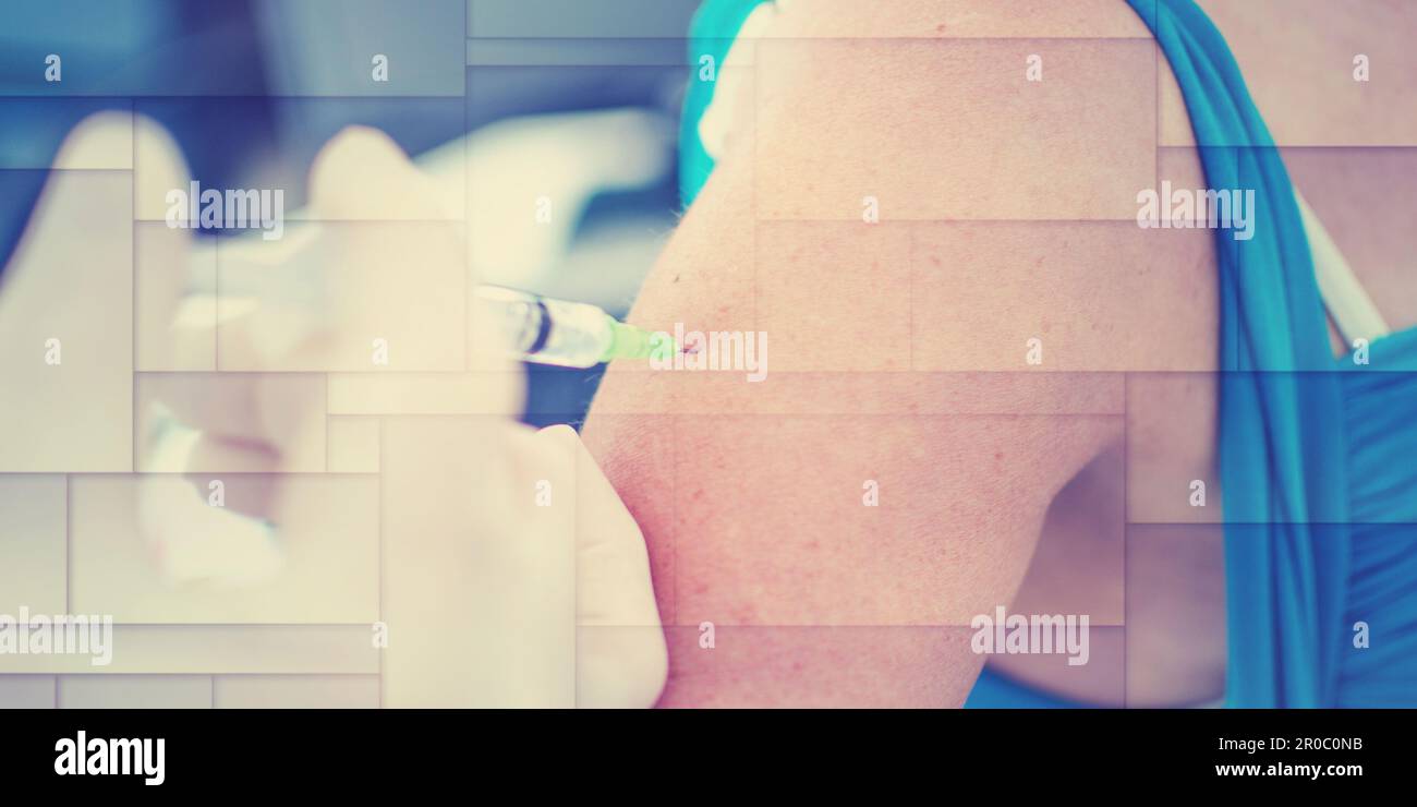 Doctor giving intramuscular injection hi-res stock photography and ...