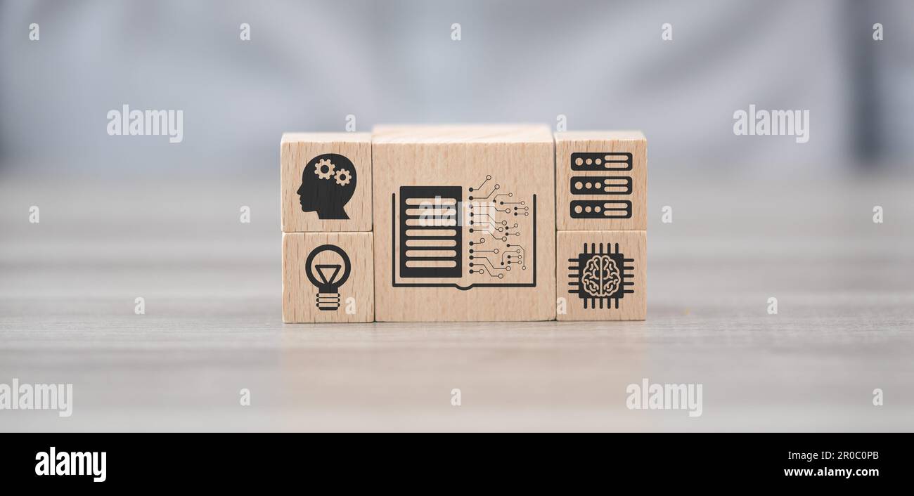 Wooden blocks with symbol of machine learning concept Stock Photo - Alamy