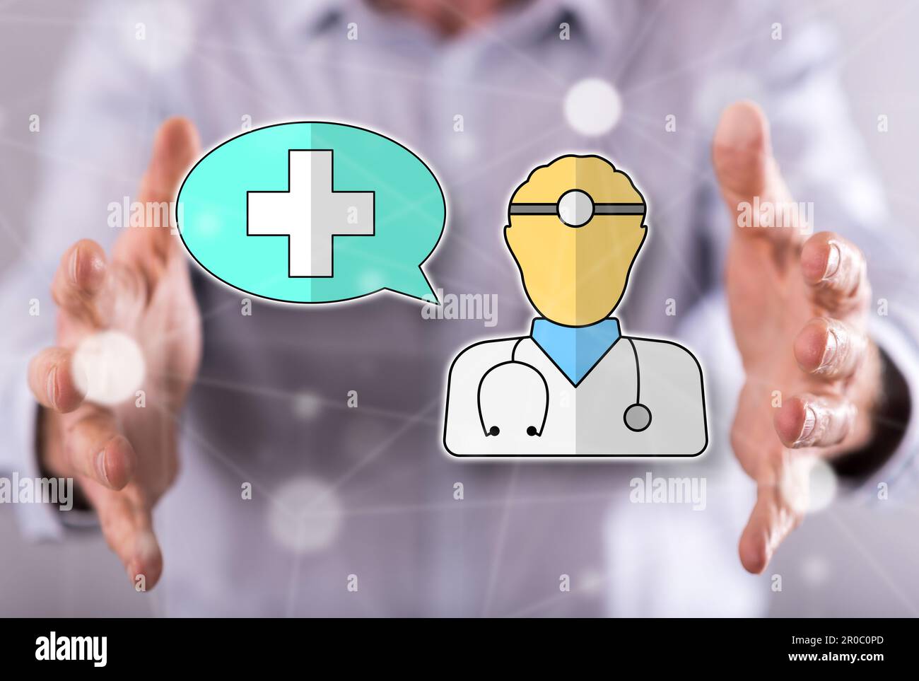 Medical support concept between hands of a man in background Stock ...