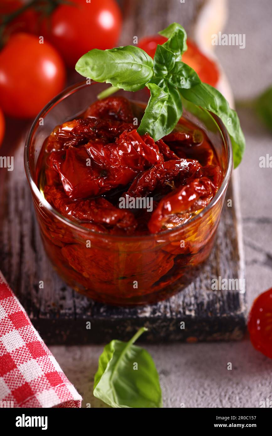 organic sundried tomatoes in olive oil appetizer Stock Photo - Alamy