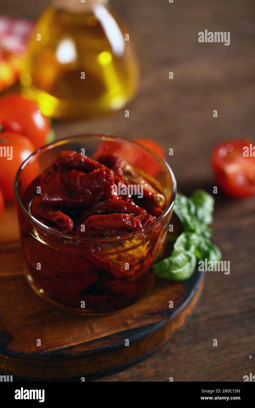 organic sundried tomatoes in olive oil appetizer Stock Photo - Alamy