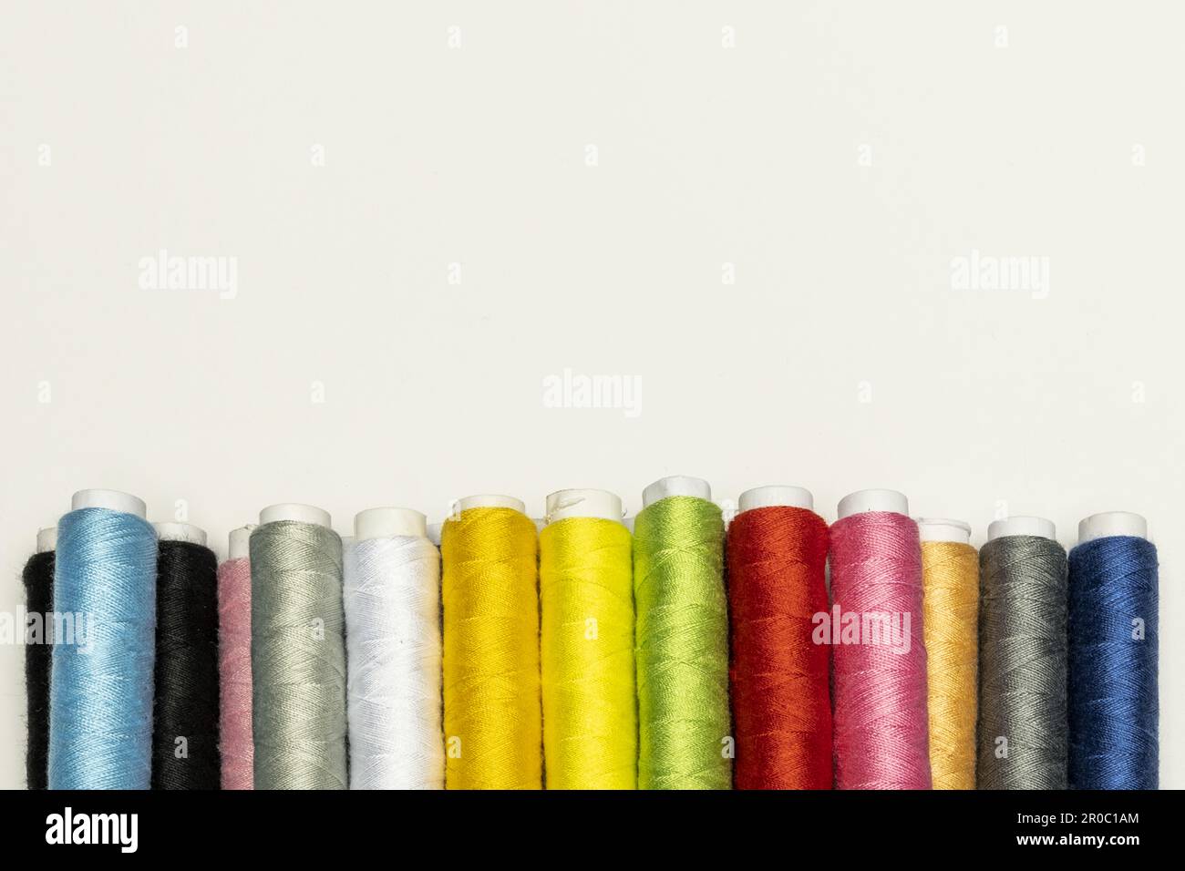 A strip of new colored reels on a plain white background Stock Photo ...