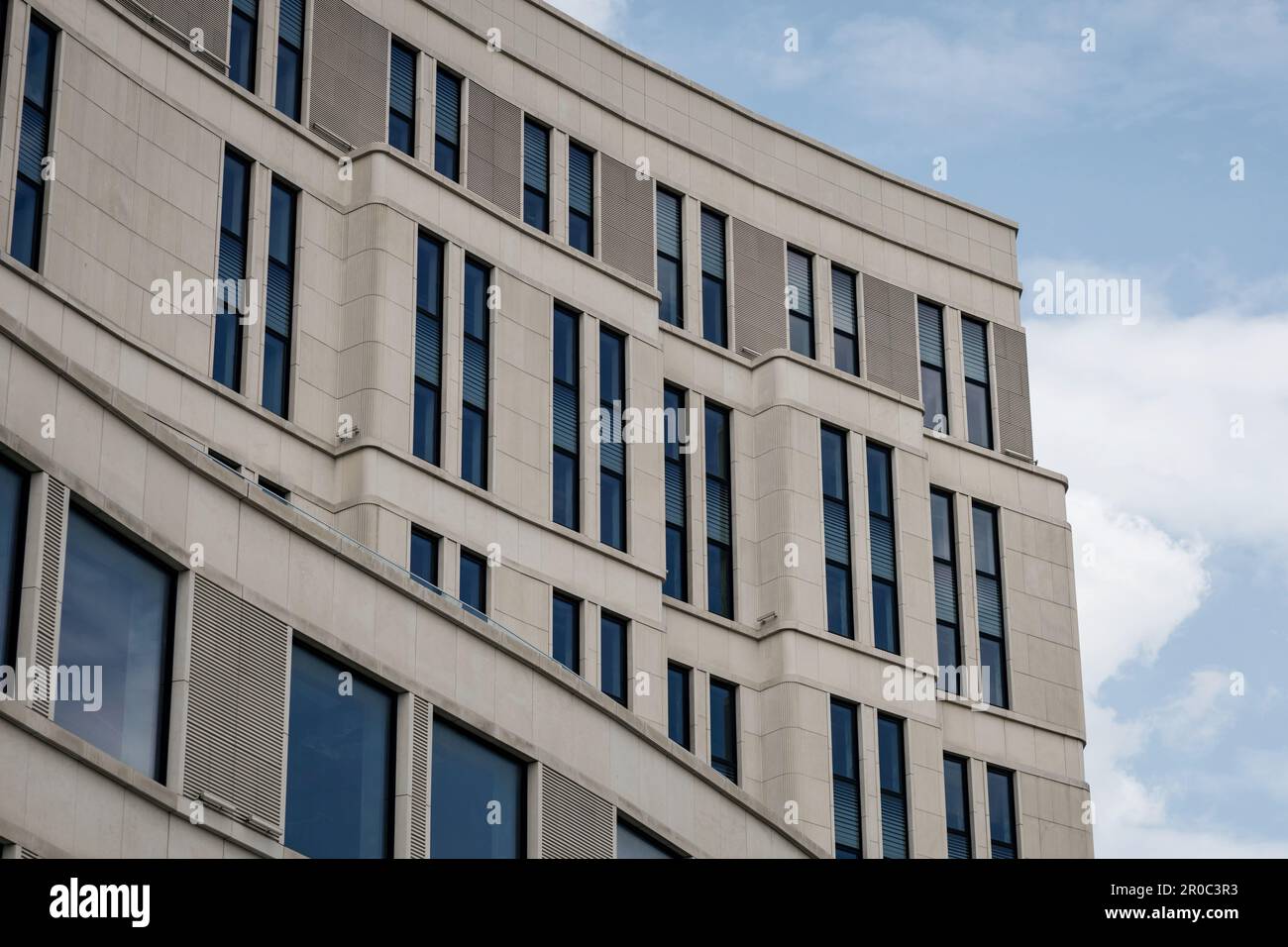 New office architecture with windows. modern apartment building in city ...