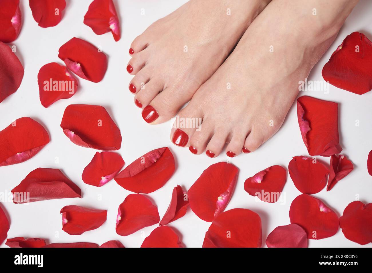 Red nail polish on feet hi-res stock photography and images - Alamy