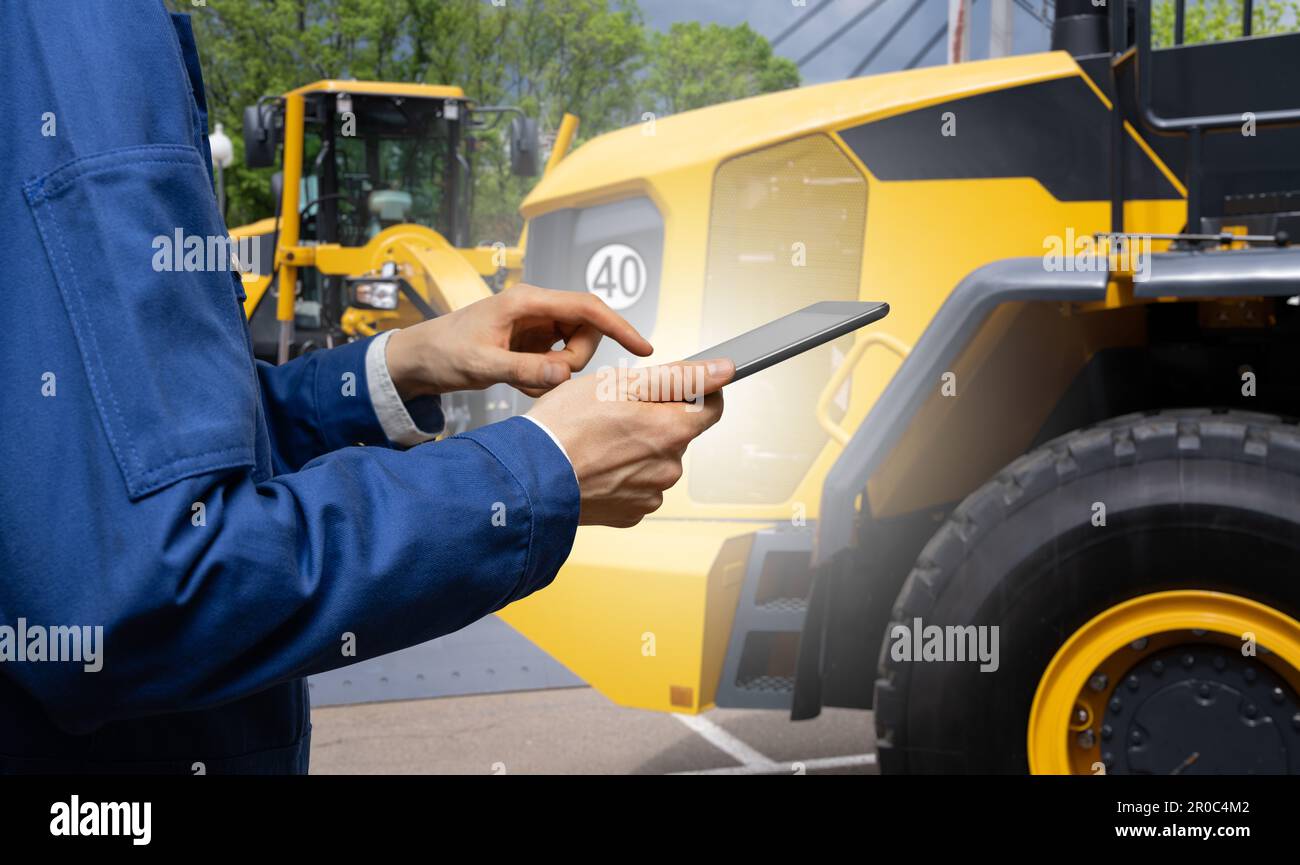 Fleet of yellow construction machines. High quality photo Stock Photo ...