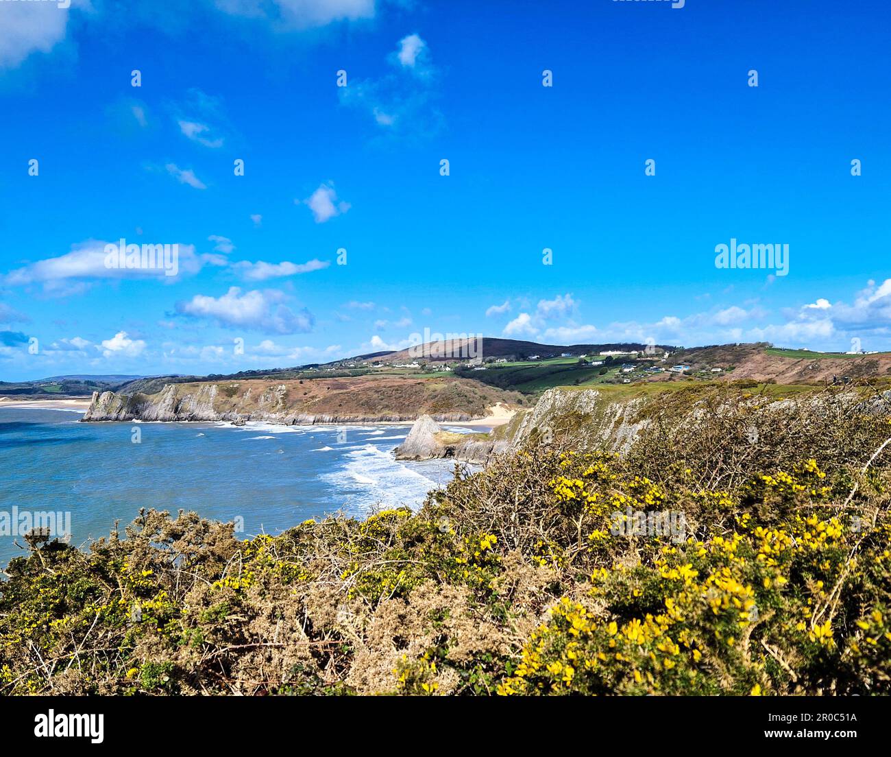 The three cliffs are visible in the background, with their sharp angles ...