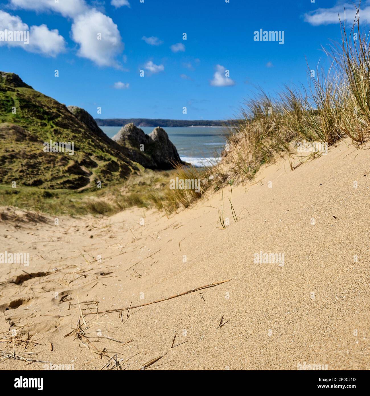 The three cliffs are visible in the background, with their sharp angles ...