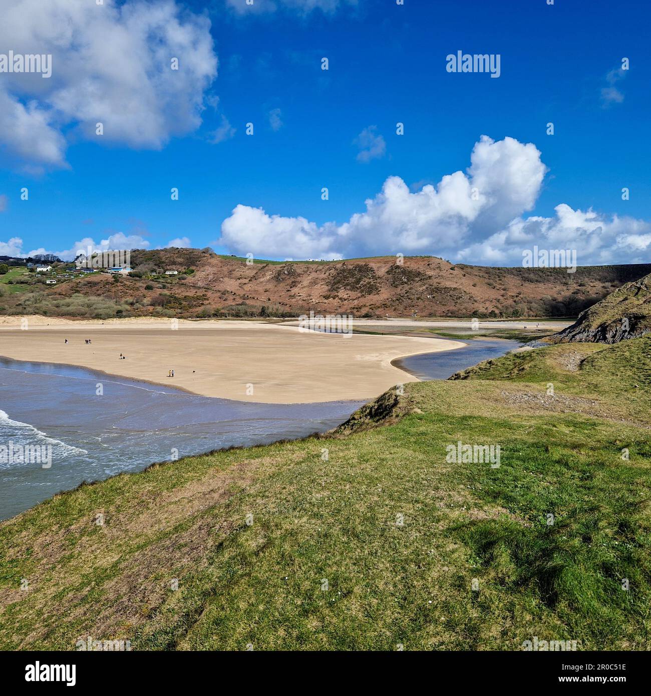 The three cliffs are visible in the background, with their sharp angles ...