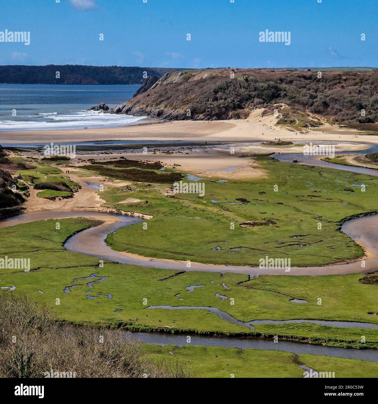 The three cliffs are visible in the background, with their sharp angles ...