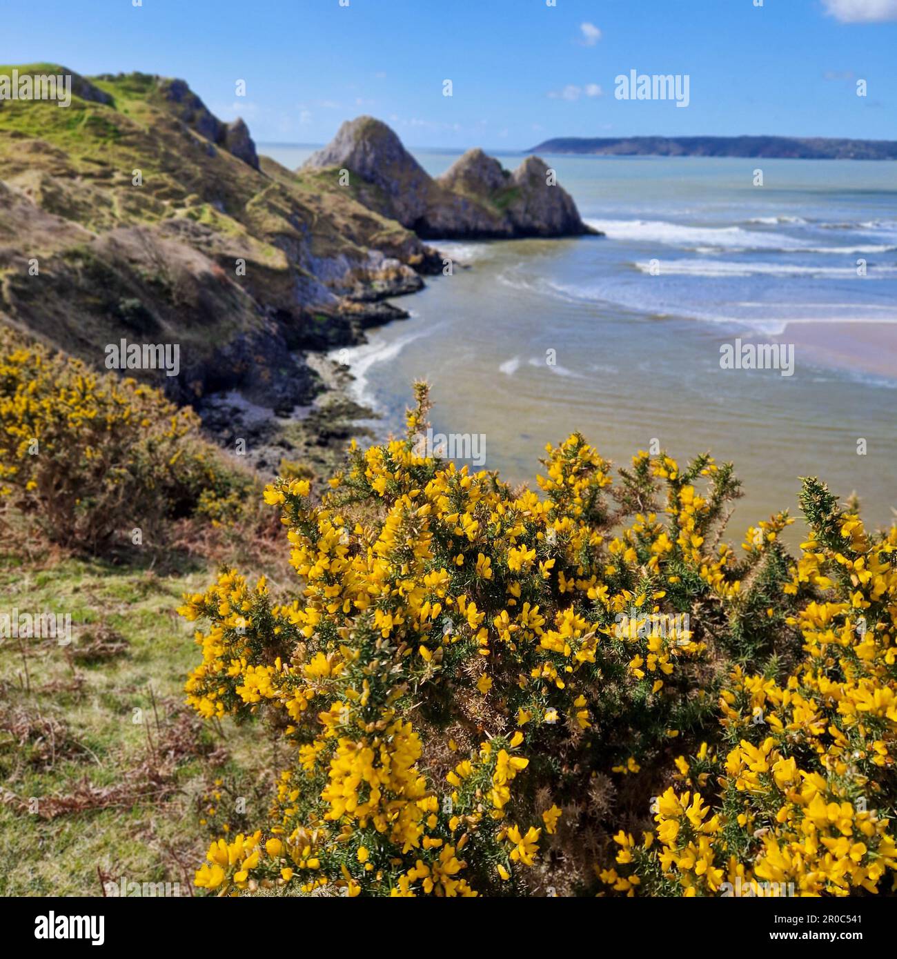 The three cliffs are visible in the background, with their sharp angles ...