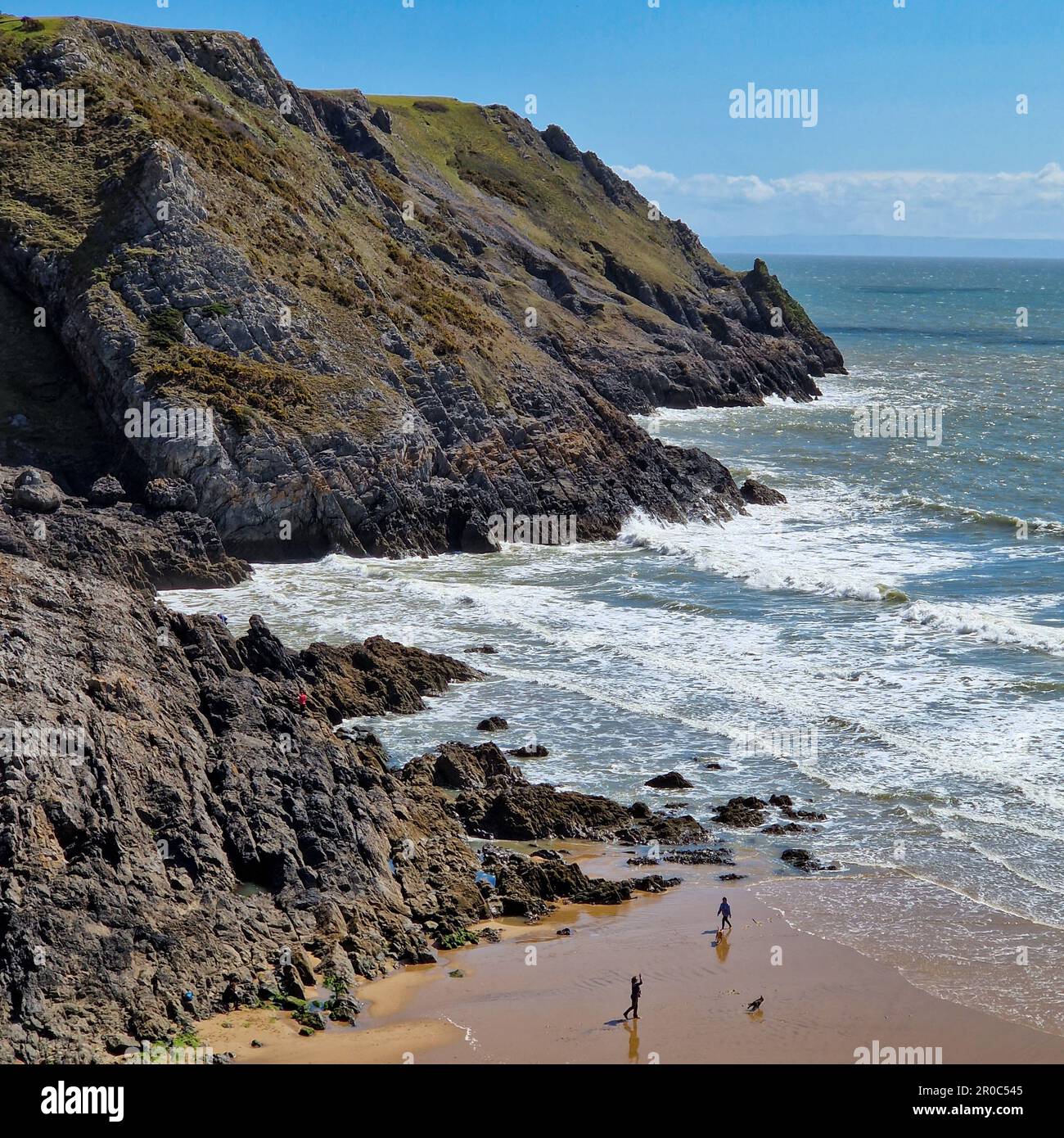 The three cliffs are visible in the background, with their sharp angles ...