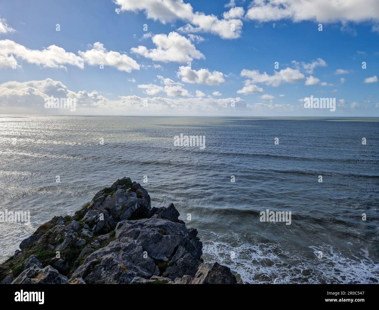 The three cliffs are visible in the background, with their sharp angles ...