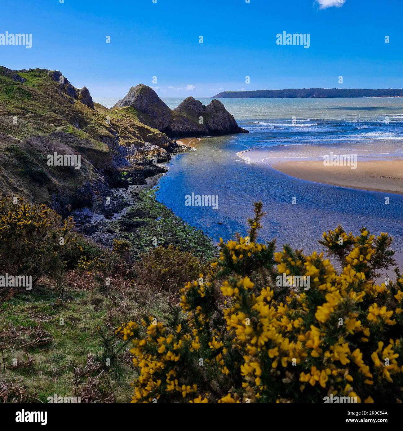 The three cliffs are visible in the background, with their sharp angles ...