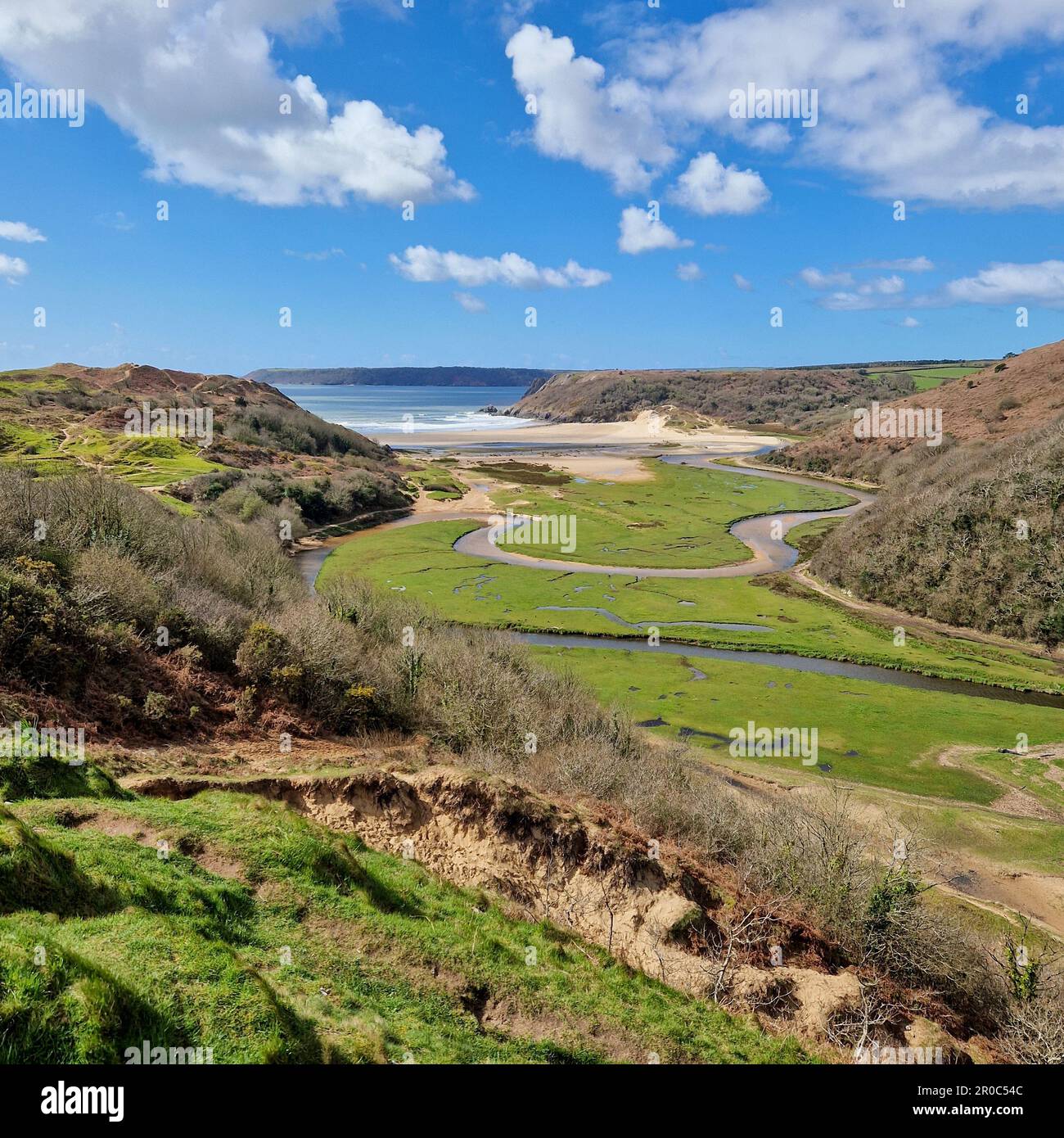 The three cliffs are visible in the background, with their sharp angles ...
