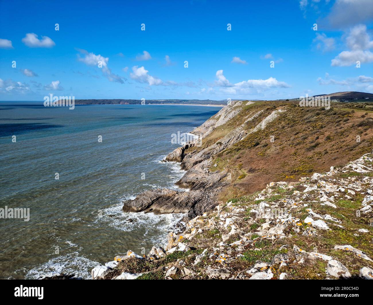 The three cliffs are visible in the background, with their sharp angles ...