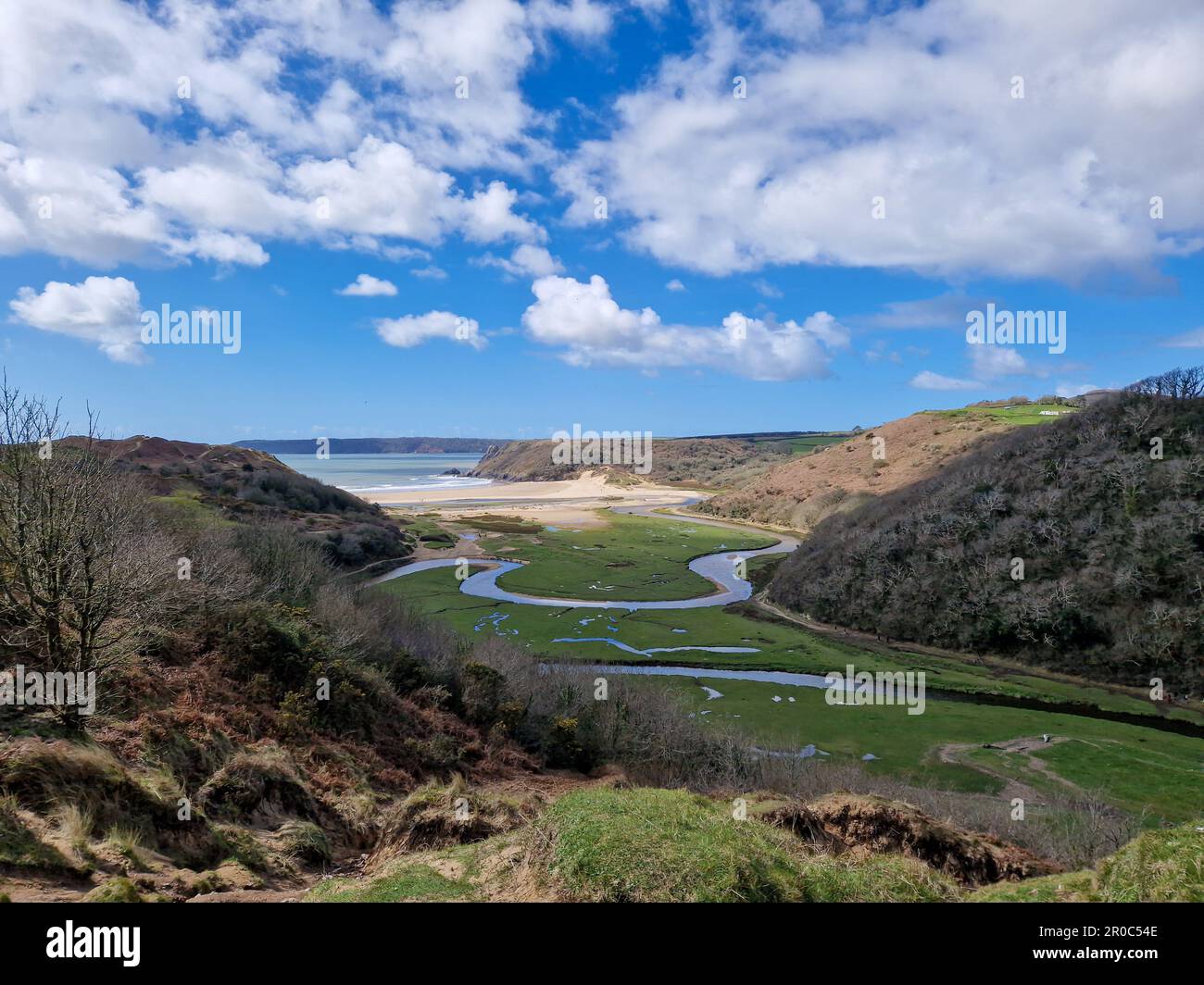 The three cliffs are visible in the background, with their sharp angles ...