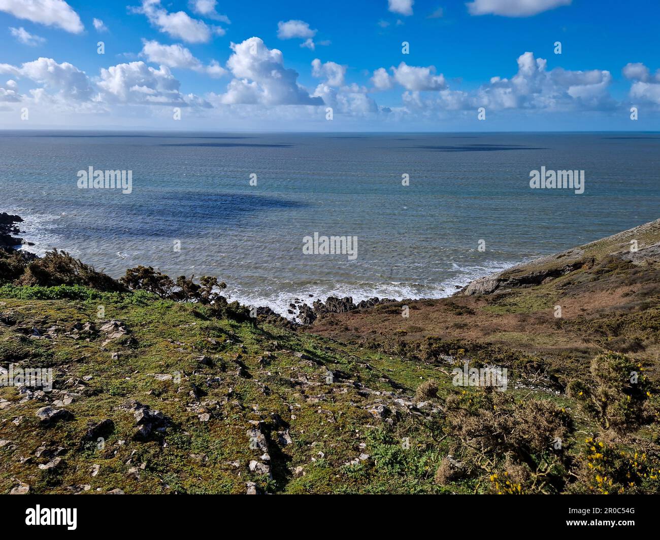 The three cliffs are visible in the background, with their sharp angles ...